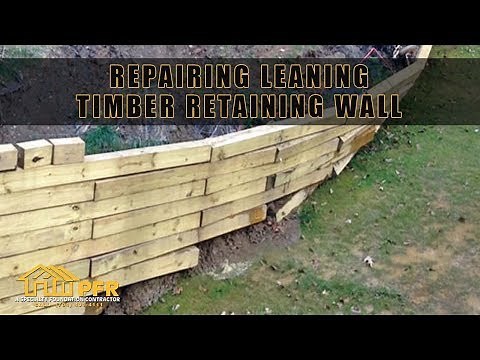 REPAIRING LEANING TIMBER RETAINING WALLS IN CHARLOTTE, NC. STILL SERVING THE PUBLIC IN 2025