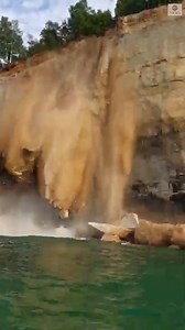 LOOK OUT BELOW! Kayakers on a tour of Pictured Rocks National Lakeshore in northern Michigan escaped injury when a large section of cliff crashed into Lake Superior. https://abcn.ws/31Ghjuo | ABC News