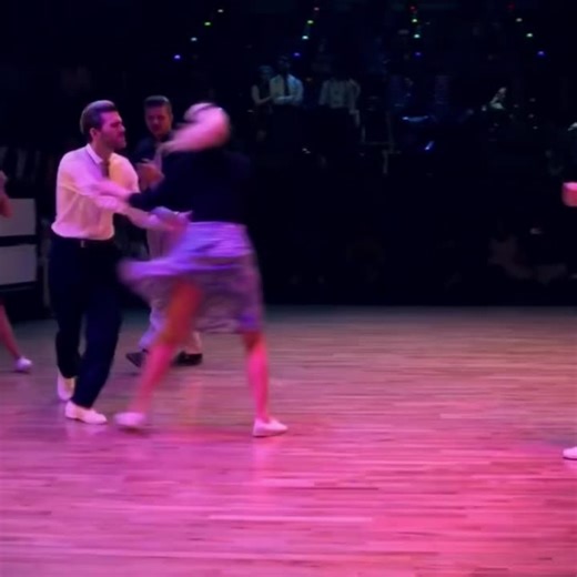 Energetic Swing Dance Performance on Stage