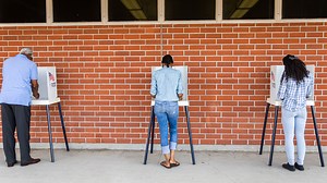 What is voter intimidation and how do I report it in Ohio and Michigan?