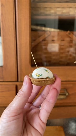 walnut shell pin cushions made with scrap fabric—the stitch used is a basic running stitch and the fabric is glued into the shell. #DIY #upcycling #scrapfabric #fabricscraps #sewingprojects #lowwaste #zerowaste #cottagecore