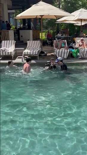 Learning how to scuba dive in the pool!