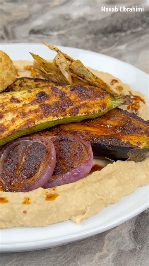 Hummus with chips and grilled vegetables