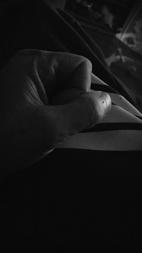 Hand Peace Sign Gesture with Tattoos