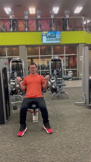 How To Use A Strict Curl Machine At A Commercial Gym