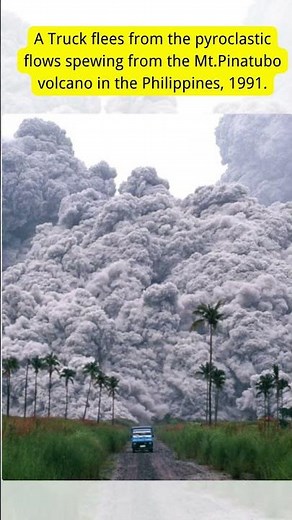 A Truck flees from the pyroclastic flows spewing from the Mt Pinatubo volcano in the Philippines, 19
