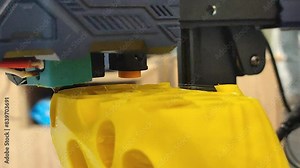 The process of printing an object on 3D printer from molten plastic. 3D printer printing model using molten plastic from extruder. 3D printing technology. New modern additive prototyping technologies