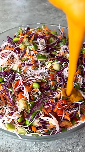 SPRING ROLL INSPIRED CHOPPED VERMICELLI SALAD WITH CARROT-GINGER-PEANUT DRESSING. This one is sorta in between that delicious carrot-ginger dressing from a restaurant and a yummy peanut sauce but lighter! **makes 2 cups of dressing and you only need about 1 cup for the salad—either make half or save the rest for other salads or a dip!** RECIPE LINKED IN BIO AND ON INSTAGRAM (link in bio). #vegetarian #veggies #noodles #easyrecipes #glutenfree #healthycooking #healthyeating #vegan | Caitlin Lates