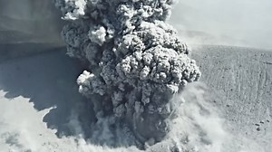 Drone captures dramatic footage of erupting volcano in Japan