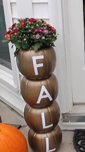 6.4K views · 88 reactions | Add this DIY stacked pumpkin planner to your fall porch decor! All you need is a few pumpkin buckets from your local dollar store and you've got a simple, inexpensive DIY! Head to my blog for more info (link in bio)! #dollarstore #dollartreecraft #falldecor #falldiy #pumpkin⁠ ⁠ [https://www.thecountrychiccottage.net/pumpkin-planter/] | Angie Holden The Country Chic Cottage | Facebook