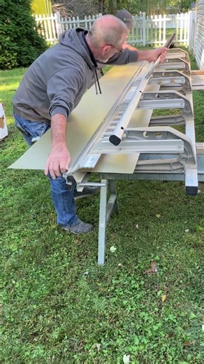 Old School Teaches Young Hand How to Use a Metal Brake