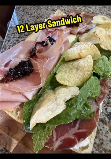12 layer sandwich made for a champion. 😋😋 1. Toasted Ciabatta loaf split in half ** One side: 2. Labaneh 3. Zaatar 4. Salame 5. Capocollo 6. Prosciutto 7. Lettuce 8. Salt & vinegar chips ** Other side 9. Goat cheese 10. Muenster cheese 11. Mortadella 12.Let me know what you think and I hope you remake it! . #food #fyp #sandwich #healthy #cooking
