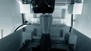 3D printer. Working 3d printer close-up. 3d printer printing object from molten plastic. Printing prototype. New modern printing technology on 3D printer. Additive progressive technologies. FDM