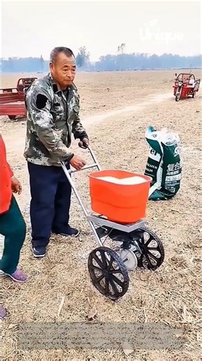 Using push fertilizer spreaders: people using push fertilizer spreaders