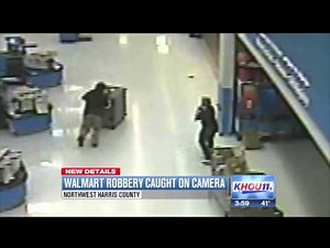 Caught on camera: Wigged Walmart robber terrorizes employees