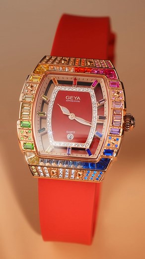 ❤️ The Brilliance of Passion – Time in Full Color A bold fusion of art and elegance. The ruby-red dial, rainbow gemstone bezel, and rose gold case capture every heartbeat of beauty. ✨ Crafted to shine, designed to stand out. 💎 Sapphire Crystal · Quartz Precision · Limited Edition ⏳ Because time, like passion, should never fade. | GEYA WATCH