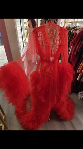 Hibiscus Belle on Instagram: "Step into full Old Hollywood glamour with these sheer tulle showgirl robes, designed for maximum drama, movement, and cinematic presence. Each robe is crafted from layers upon layers of airy tulle, creating an ethereal silhouette that floats, swirls, and commands attention with every step. ✨ Design Details • Sheer tulle construction throughout • Dramatic floor-length train with cascading ruffles • Voluminous ruffled cuffs for iconic vintage starlet flair • Long, flo