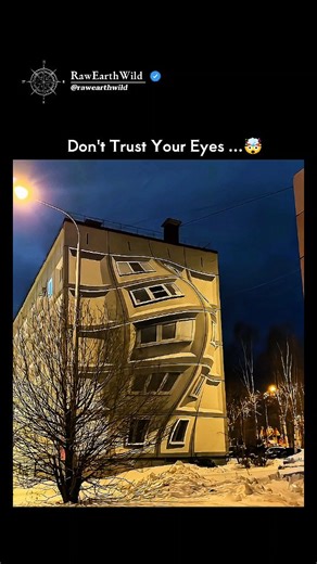 Earthx on Instagram: "This video showcases a stunning example of trompe-l'œil—a French term meaning "deceive the eye"—in architectural painting. It is not a 3D structure with a massive hole, but a masterfully executed two-dimensional painting on a flat surface that creates a perfect illusion of depth, volume, and rupture. This is a pinnacle of both artistic skill and applied visual engineering. The technique relies on advanced principles of perspective, shading (chiaroscuro), and color theory. T