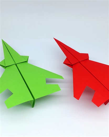 9.2K views · 75 reactions | ✈ Unleash your inner pilot! ✈ Watch our new video to discover the secrets to folding an epic Fighter Jet paper plane that looks incredible AND flies like a dream. Perfect for kids and adults alike! What you'll learn: ✅ Simple folds for a sleek design ✅ Tips for better flight #airplane #toys #handmade | Origami Art & Crafts | Facebook