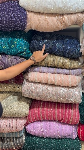 Malgudi Designs on Instagram: "Luxury handwork fabrics Created using time-honored techniques such as intricate embroidery, hand weaving, beadwork, and embellishment. these fabrics are distinguished by their rich textures, refined detailing. Crafted on luxurious base fabrics such as tulle, silk, net, or organza, these bead-embellished textiles exude opulence and refinement. Visit store for more fabric collections Malgudi designs, Lokmanya street, R.s Puram Coimbatore-7604824448 #fabrics #luxuryha