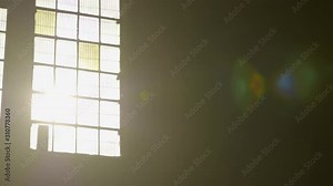 A panning, medium-closeup shot of refraction of pink and yellow hues from the glaring sunlight passing through a Georgian window. Stock Video