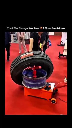 Science/ Technology World/ Latest on Instagram: "The post features a 1:00-minute TikTok video demonstrating a truck tire changer machine, where a heavy-duty tire is rotated and handled using powered clamps and controlled lifting mechanisms. Originally shared on Tik Tok by @auto_equipment_tools, the clip highlights how garage equipment is designed to safely manage large commercial tires while reducing manual effort and improving efficiency. The breakdown has already gained over 2.6 million views,