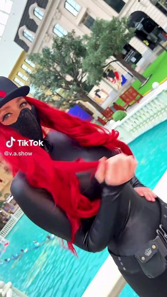 Stylish Poolside Poses in Black and Red Outfit