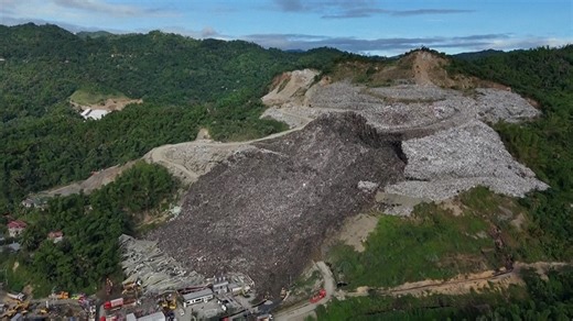 Garbage landfill collapse kills one and leaves dozens missing in Philippines