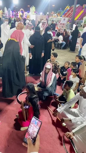 Outdoor Nighttime Fair: Fun with a Metallic Hoop