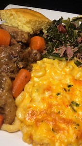Smothered oxtails, extra cheesy Macaroni , collard green with turkey legs with corn bread! 🤤🤤🤤 | China White
