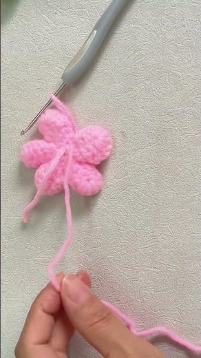 Crochet a simple flower keychain charm: check tutorial in my channel