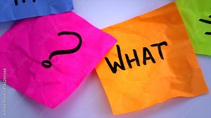 Brainstorming questions - what, who, why, how, when and where - colorful turning sticky notes
