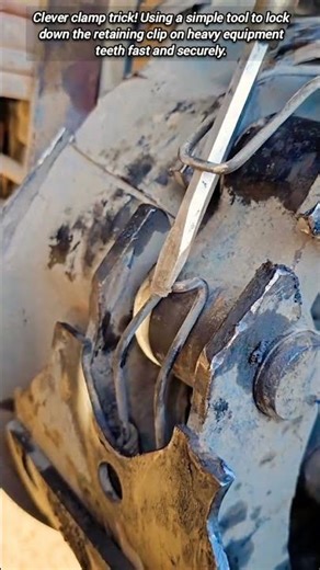 Fast screwdriver trick for closing heavy machinery clamp clips.