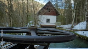 A mechanism to open wather flow to a small hydro powerplant