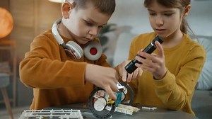 Brother and sister builds Solar Powered Robot at home