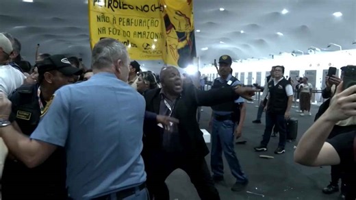 Indigenous protesters force their way into COP30 climate summit