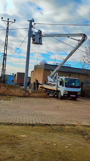 Utility Maintenance Work Above Ground in Clear Skies