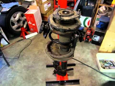 How to install new strut for Rav4 Toyota 1996 - 2005 with Big Red Strut Coil Spring Compressor