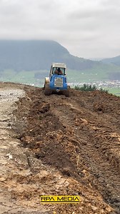 Kibag's Caterpillar crawler loader spreading out dirt at a tip area at an old quarry | RPA Media