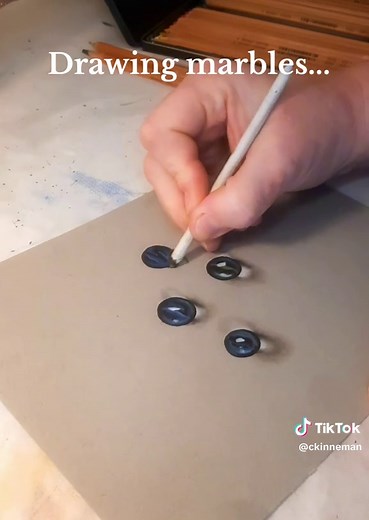 How to Draw Realistic Marbles Using Charcoal Techniques