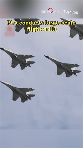 A powerful display in the sky! Watch as PLA Air Force conducts large-scale formation training—coordination, discipline, and advanced aviation in full swing. #Trending | CCTV