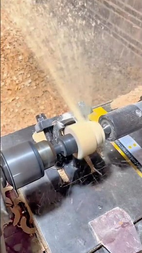 Wood Lathe Turning Shaping a Small Wooden Piece on a Rotating Spindle