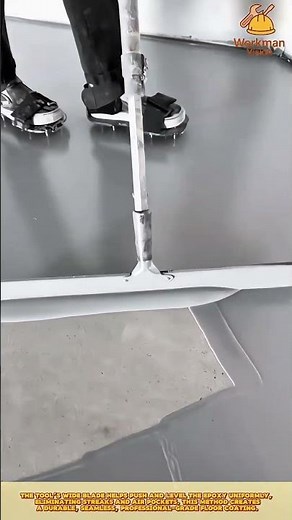 Skilled Worker Spread epoxy evenly with long-handle smoother