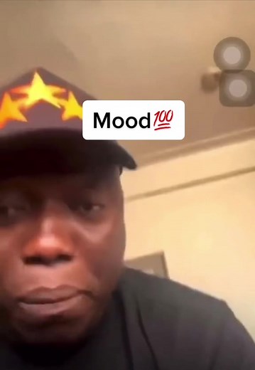 Humorous Mood: Person in Cap Reacts on Social Media