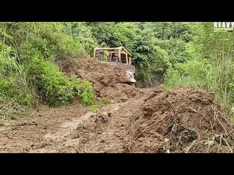 Amazing Caterpillar D6R XL Bulldozer Operator Working to Widen Roads on a Plantation