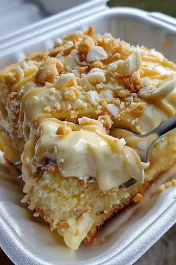 Get ready for a taste of pure comfort with this Homemade Banana Pudding Cake! 🍌🍰 This delightful dessert combines a moist yellow cake infused with fresh bananas, topped with a luscious, creamy banana pudding frosting, and generously sprinkled with crunchy vanilla wafers. It's like your favorite banana pudding in cake form – absolutely irresistible! #BananaPuddingCake #BananaCake #HomemadeCake #PuddingCake #VanillaWafers #DessertRecipe #SouthernDessert #ComfortFood #BakingLove #SweetTreats #Eas