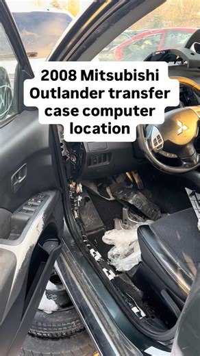2008 Mitsubishi Outlander transfer case computer 4WD control unit part number 8631A417 location