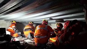 At least 91 students remain buried in rubble 2 days after school collapse in Indonesia