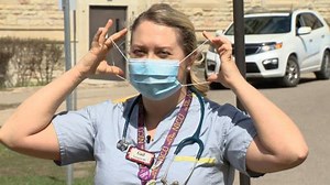 Saskatoon nurse shows how to properly put on, take off mask