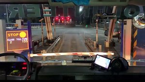 Firetruck Responding to Emergency Stops at Toll Gate to Pay Toll Fee